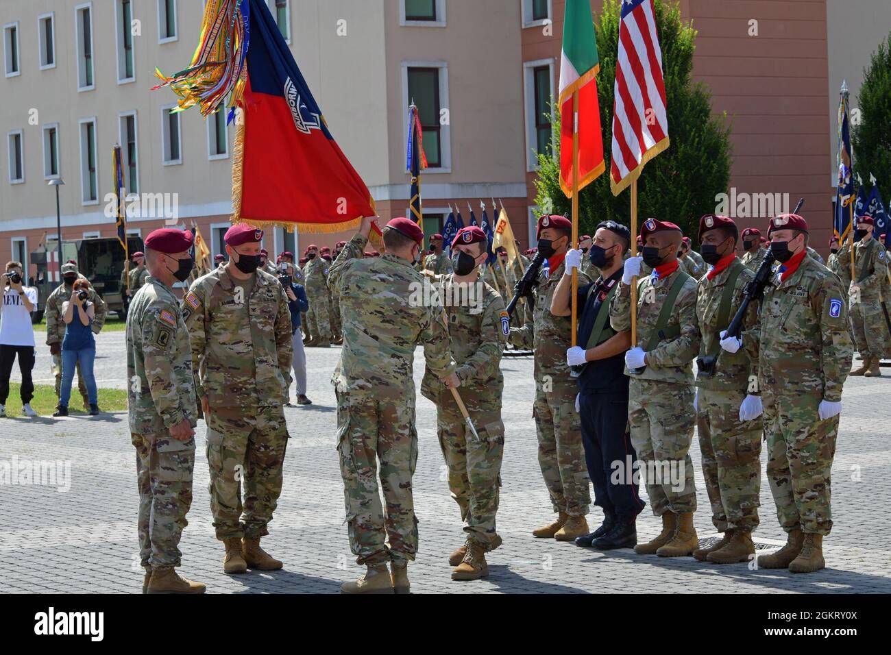 U.S. Army Kenneth J. Burgess, outgoing commander of the 173rd Airborne Brigade, receives the ...
