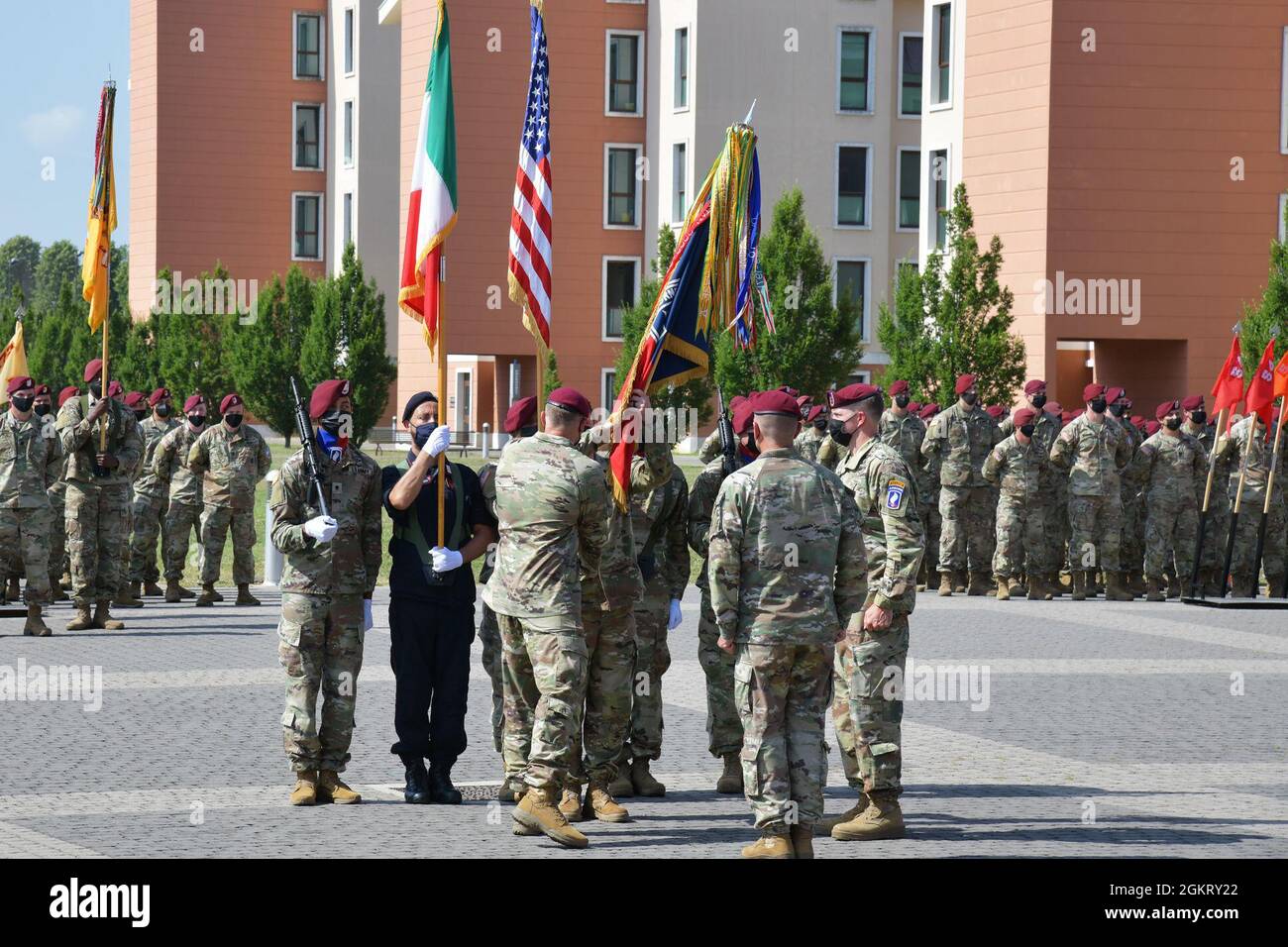 U.S. Army Col. Michael Kloepper, incoming commander of the 173rd Airborne Brigade, passes the ...
