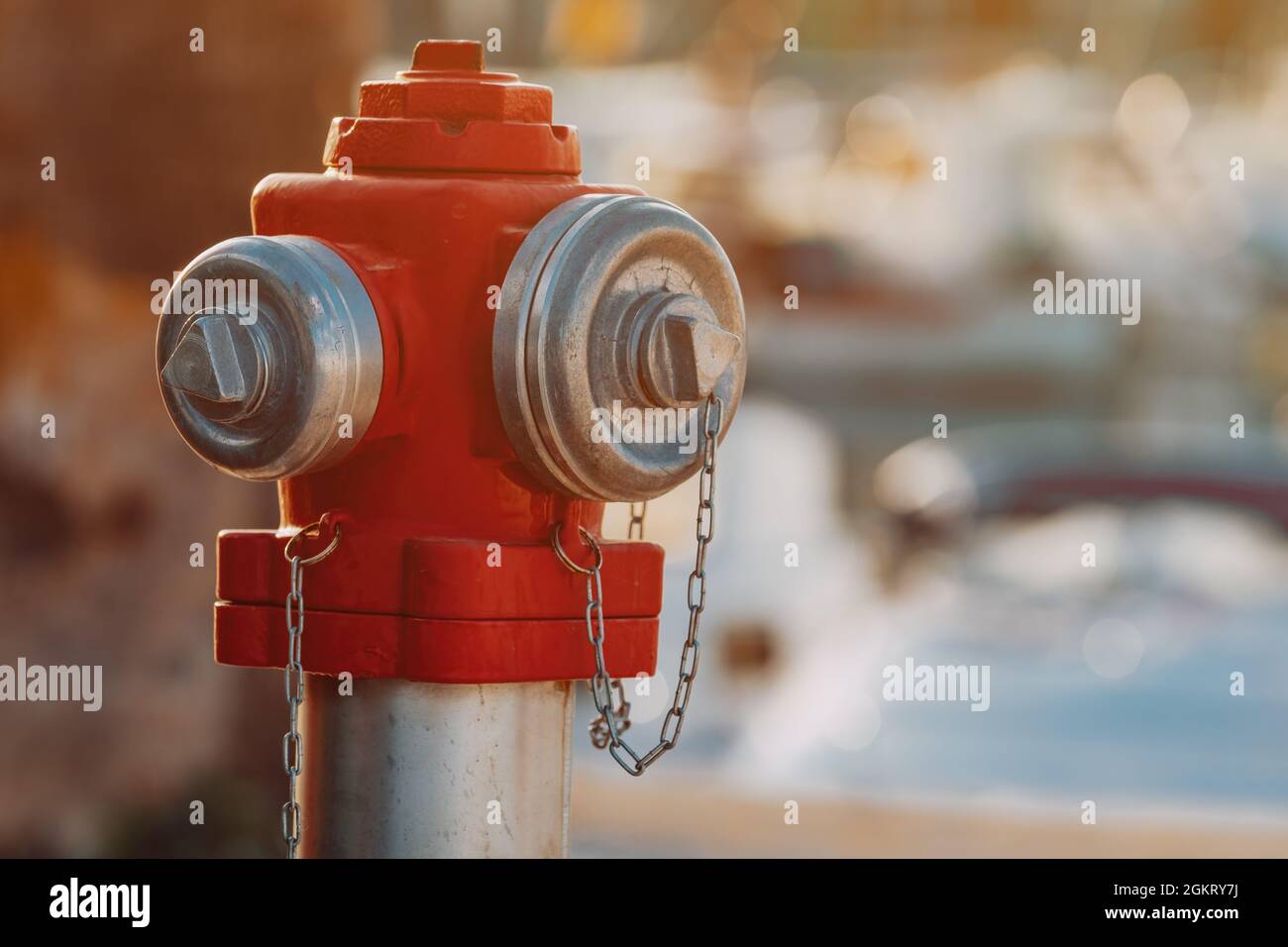 Red water hydrant on the street, selective focus Stock Photo - Alamy