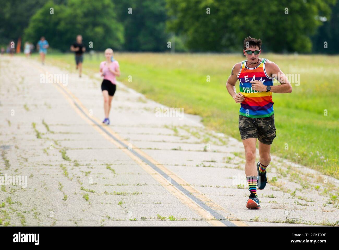 Runners participate in the Pride Month 5k run through Huffman Prairie ...