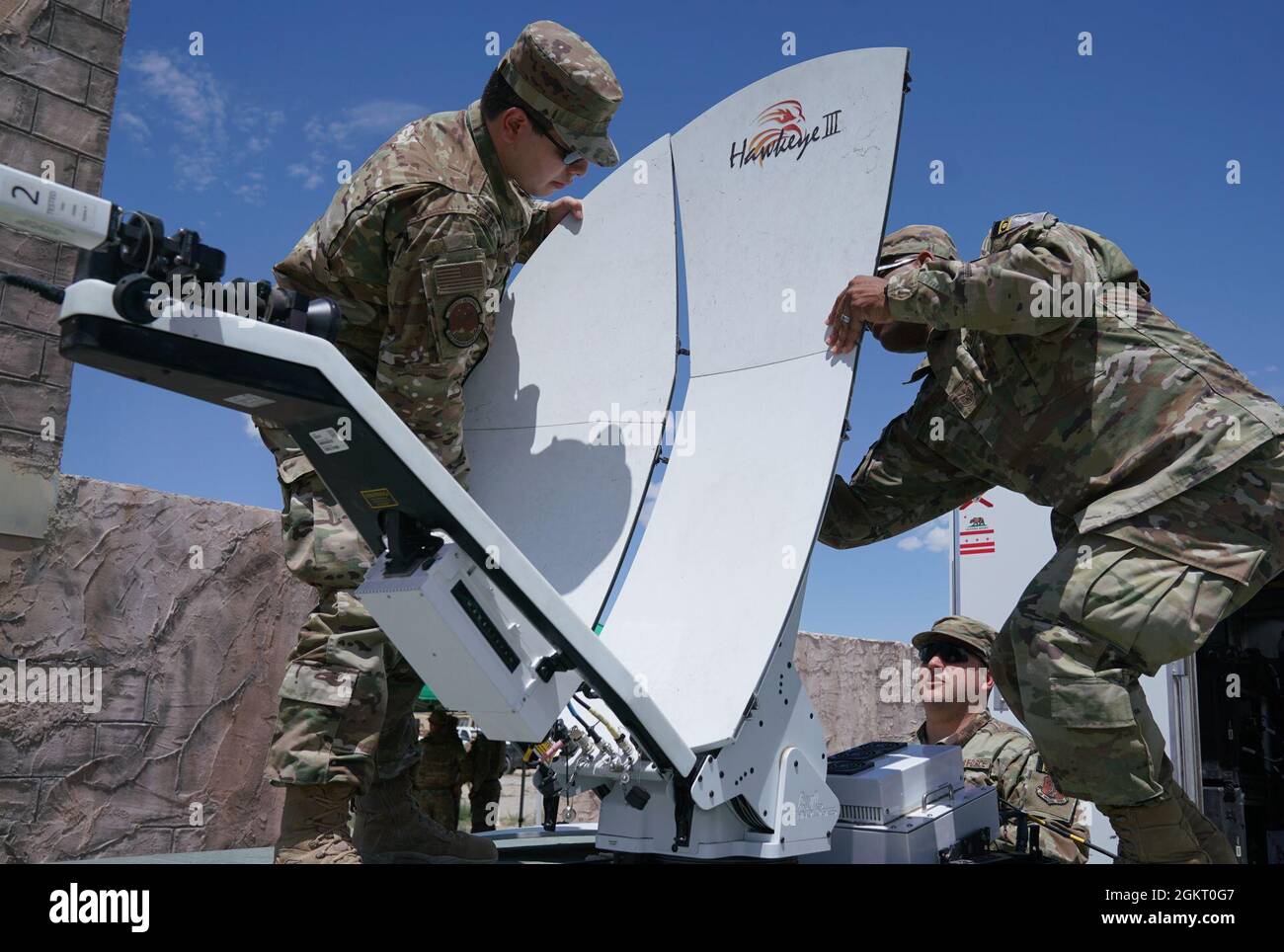 Staff Sgt. Alexander Anguiano, left, Staff Sgt. John Gunn, middle, and ...