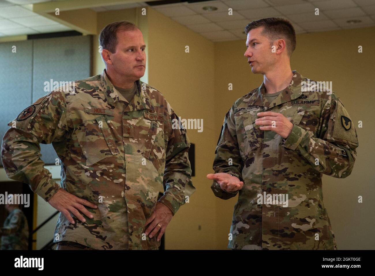 Army Maj. Matthew Szarzynski, right, 419th Contracting Support Brigade ...