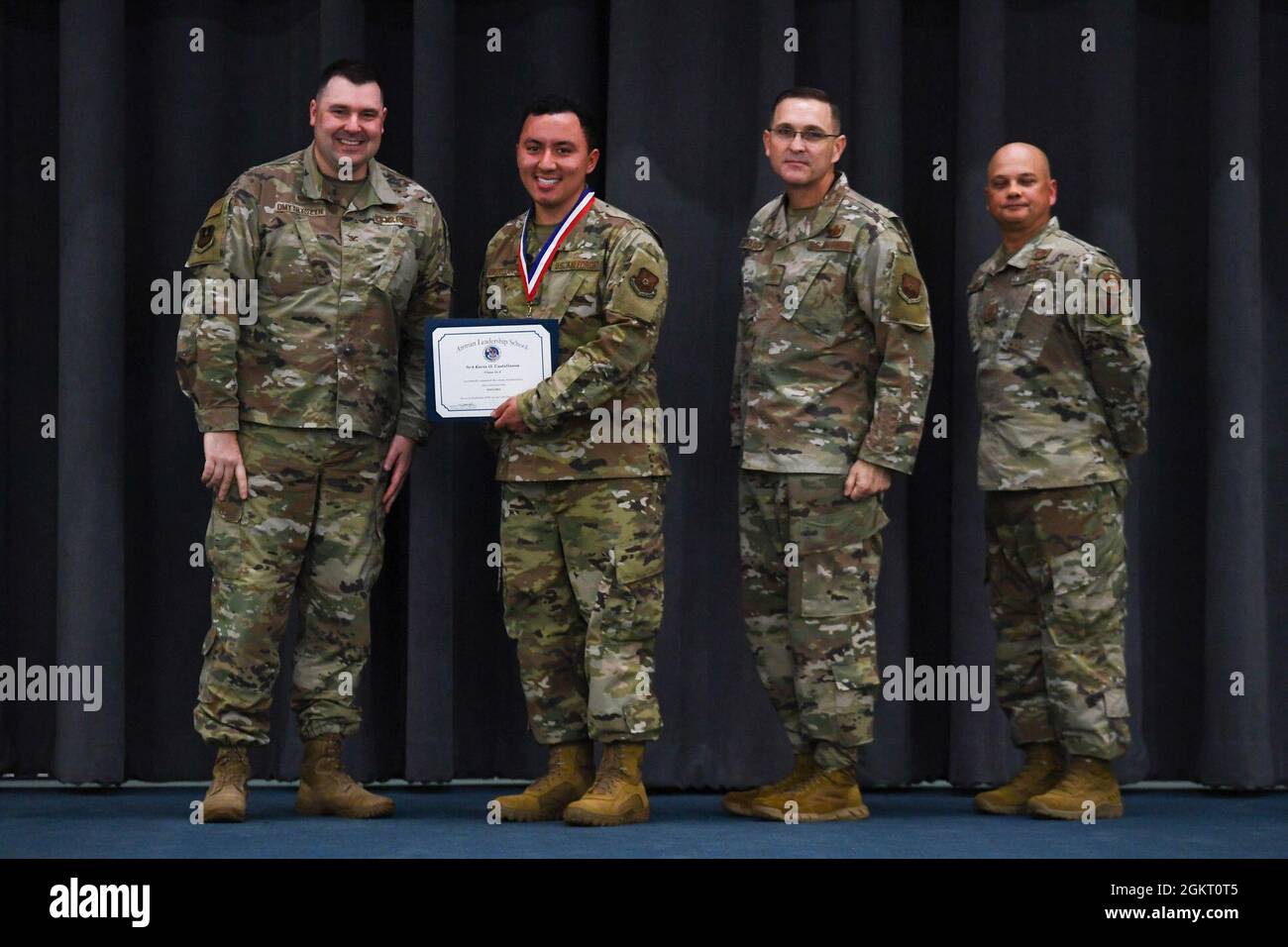 Graduates from Airman Leadership School Class 21-5 receive their ...