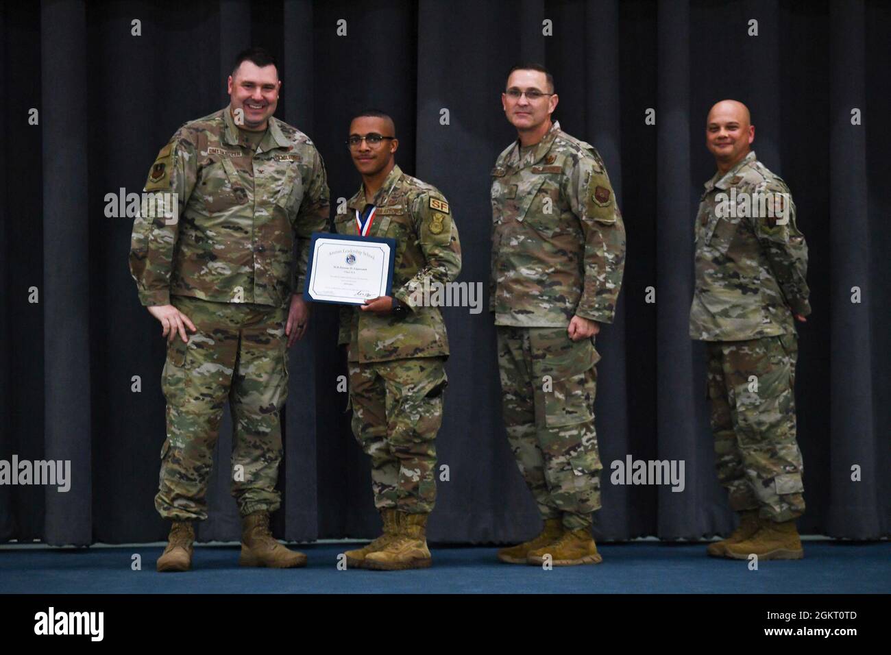 Graduates from Airman Leadership School Class 21-5 receive their ...