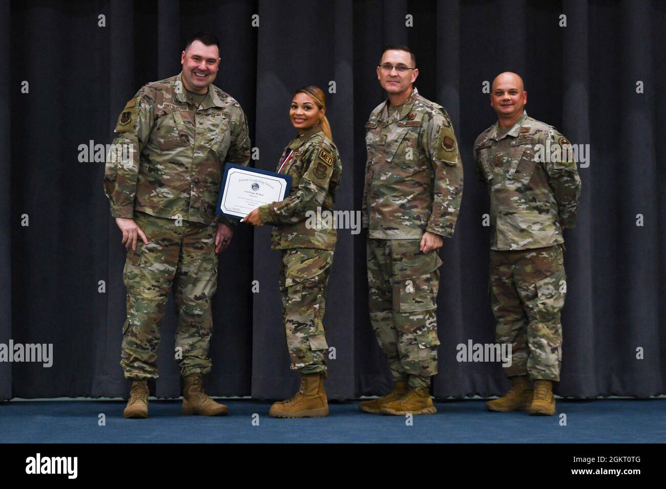 Graduates from Airman Leadership School Class 21-5 receive their ...