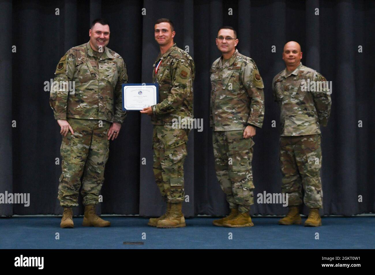 Graduates from Airman Leadership School Class 21-5 receive their ...