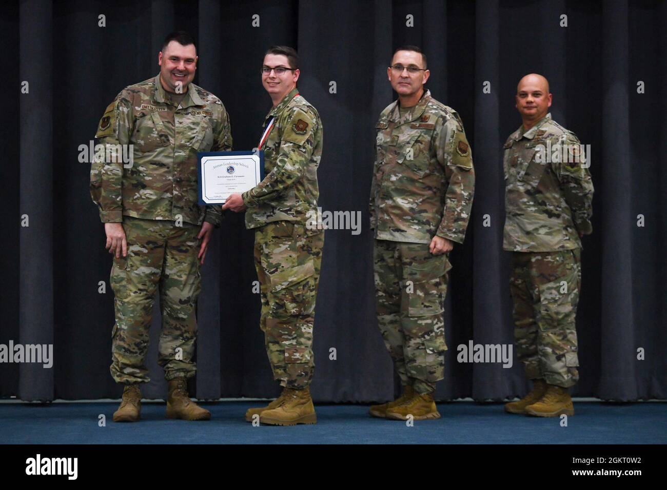 Graduates from Airman Leadership School Class 21-5 receive their ...