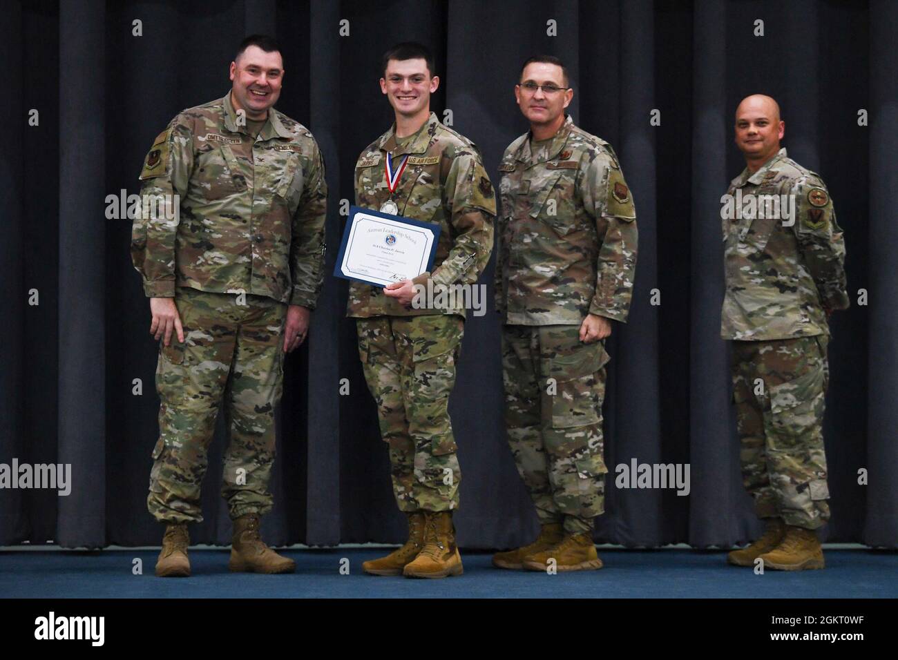 Graduates from Airman Leadership School Class 21-5 receive their ...