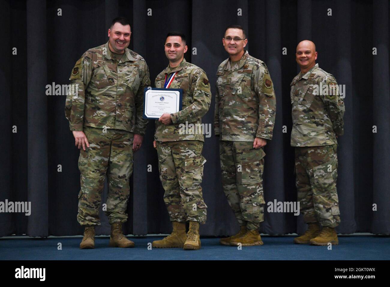 Graduates from Airman Leadership School Class 21-5 receive their ...