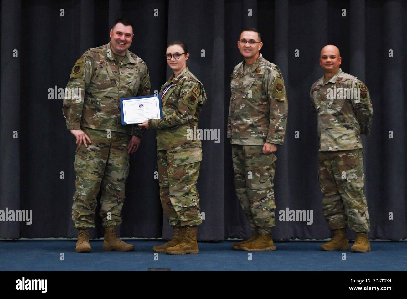 Graduates from Airman Leadership School Class 21-5 receive their ...