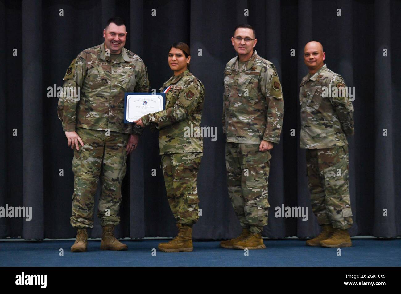 Graduates from Airman Leadership School Class 21-5 receive their ...