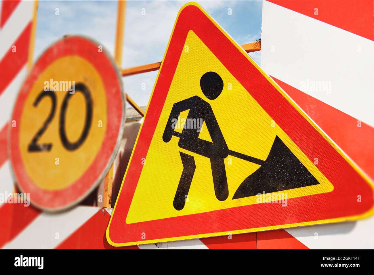 Forbidding speed limit road sign, warning road sign of repair work ...