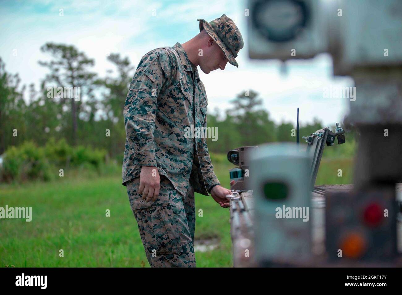 U.S. Marine Corps Sgt. Justice Rees, a Troy, Ohio, native, and armory ...