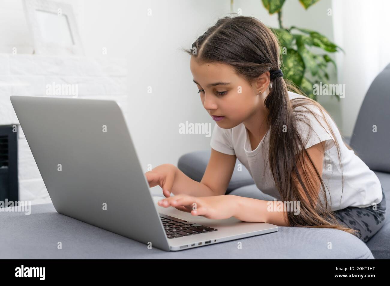 little girl studying with computer, little girl with laptop online ...