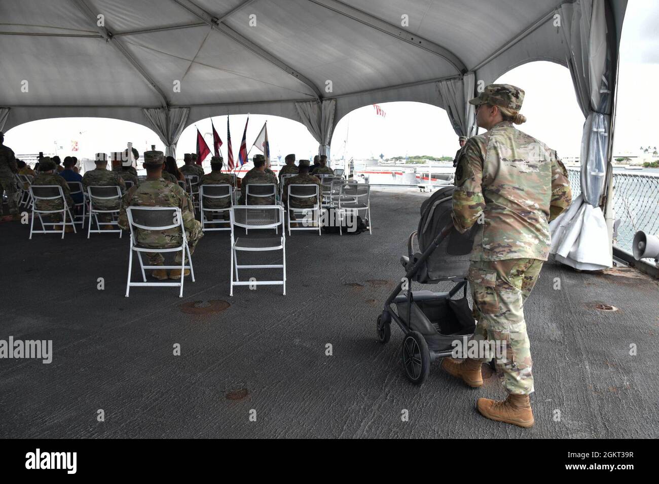 Maj. Kate Little, Dental Health Command – Pacific, walks her son during ...