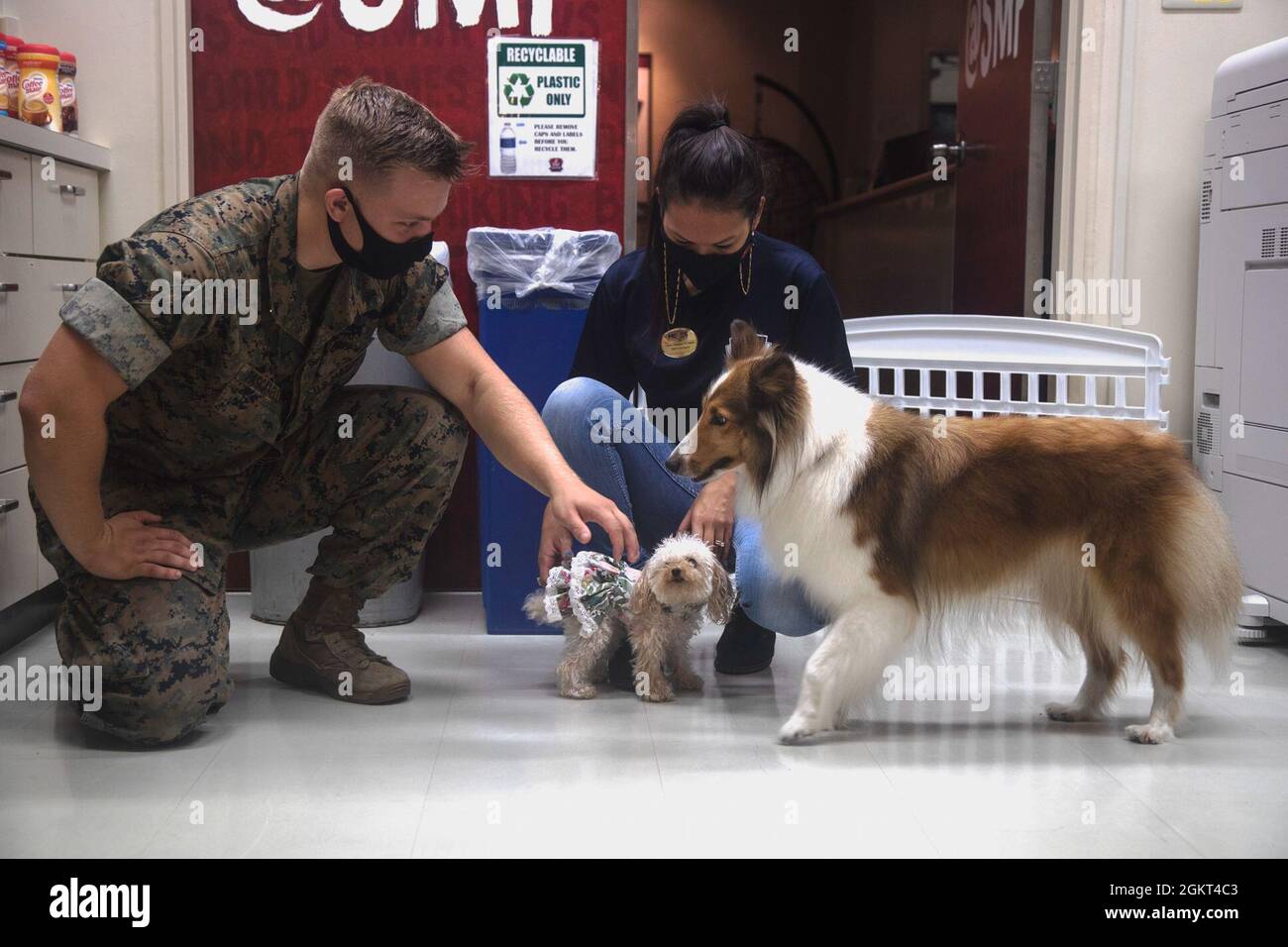 U.S. Marine Corps Lance Cpl. Anthony Pascarella, left, a ground radio ...