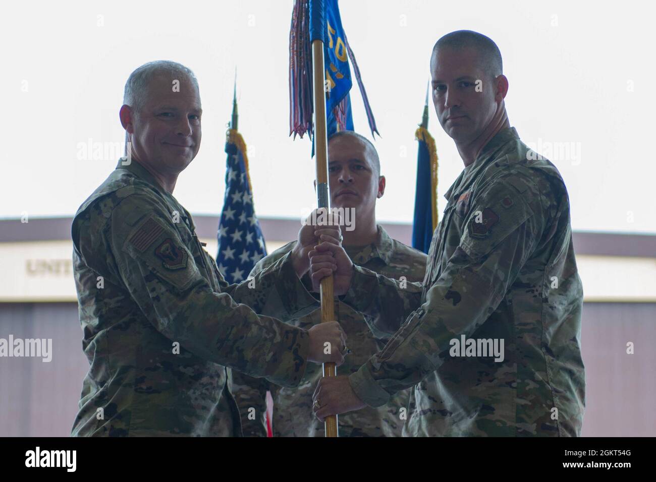 U.S. Air Force Col. Daniel Diehl, 509th Bomb Wing commander, passes the ...