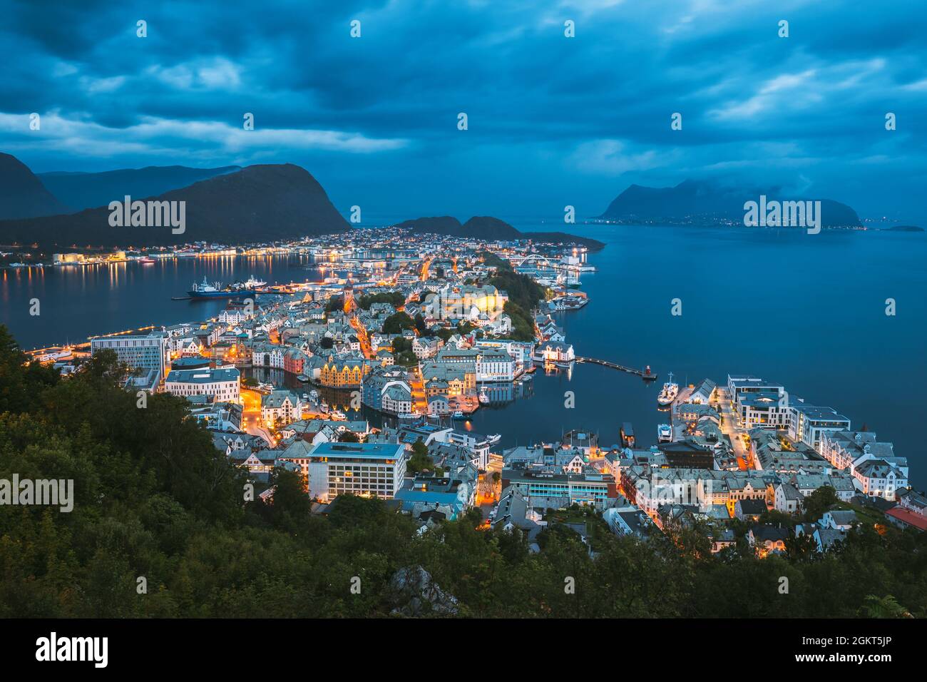 Alesund, Norway. Night View Of Alesund Skyline Cityscape. Historical ...
