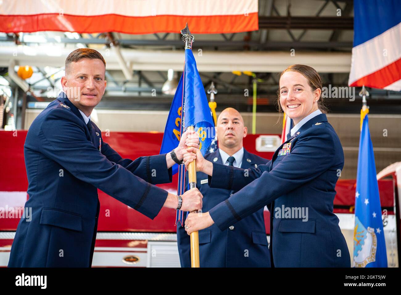 U.S. Air Force Col. Richard Martin, left, 423rd Air Base Group commander, presents the 423rd ...