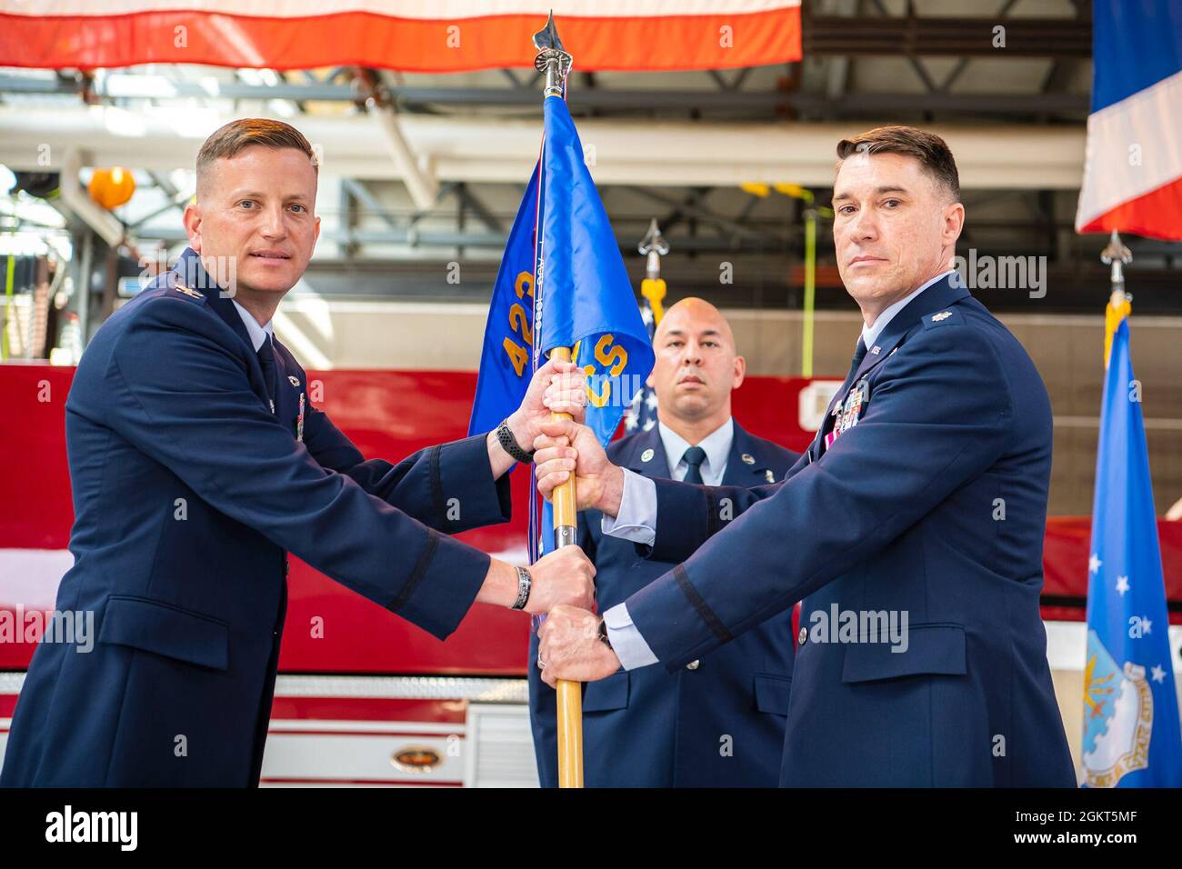 U.S. Air Force Col. Richard Martin, left, 423rd Air Base Group commander, receives the 423rd ...