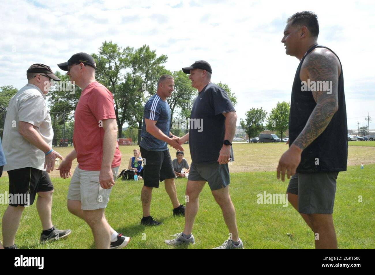 Command Sgt. Maj. John McDwyer exchanges handshakes with First Army ...
