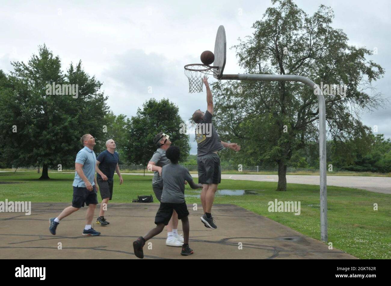 First Army soldiers and civilians participate in a basketball game ...