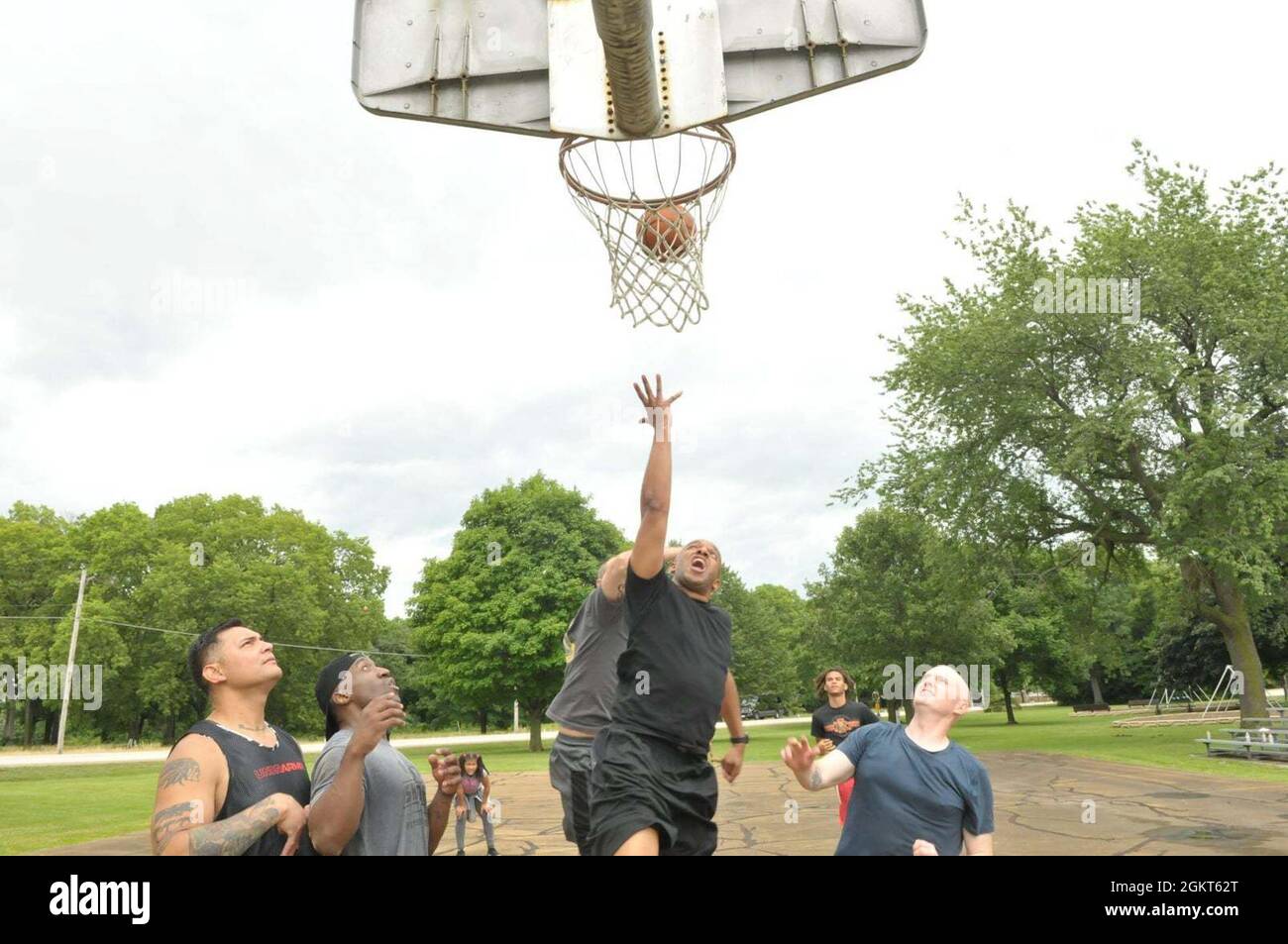 First Army soldiers and civilians participate in a basketball game ...
