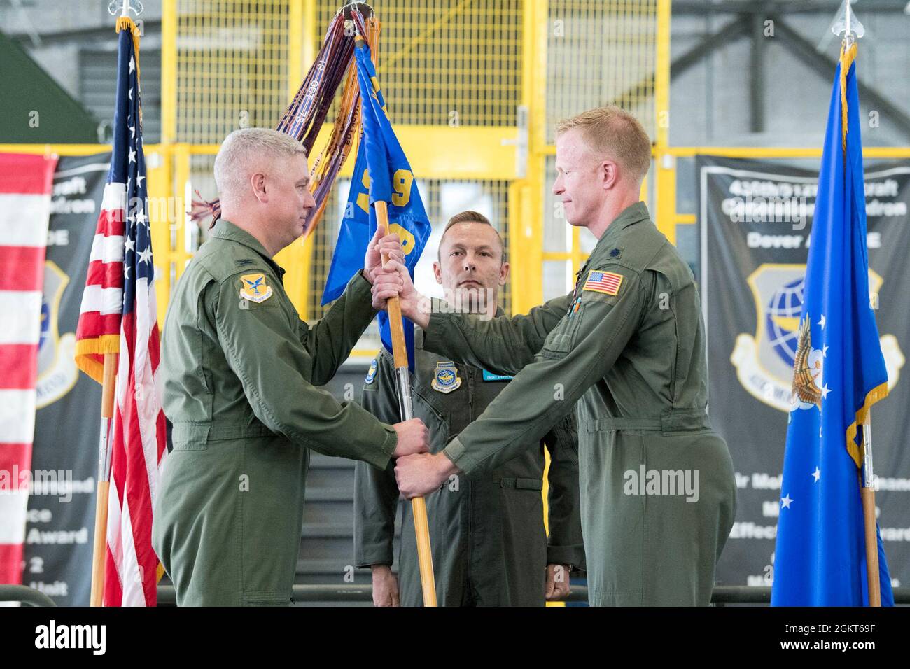 Lt. Col. John Habbestad, right, outgoing 9th Airlift Squadron commander ...