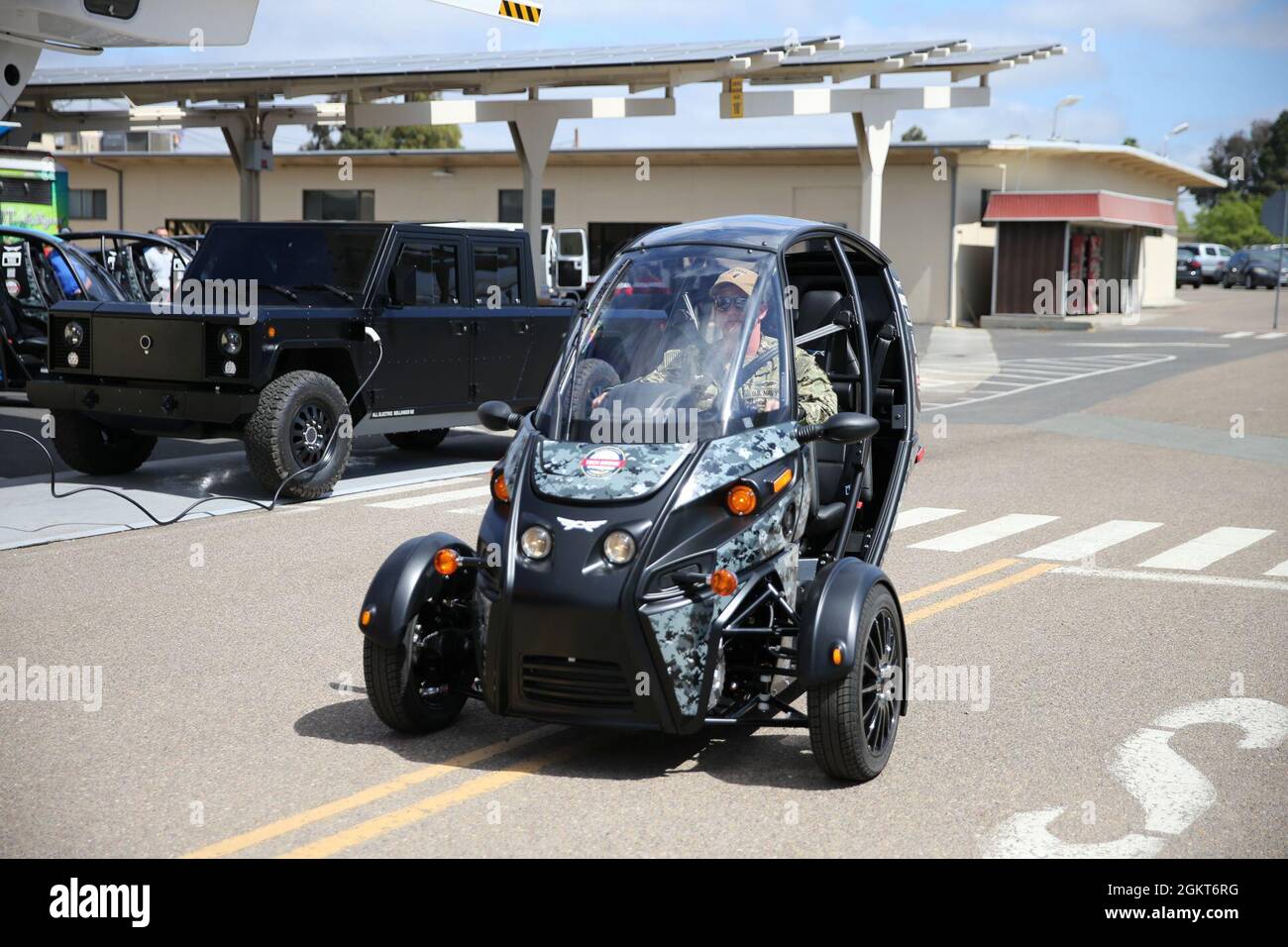 A U.S. Sailor with the Naval Information Warfare Systems Command drives ...