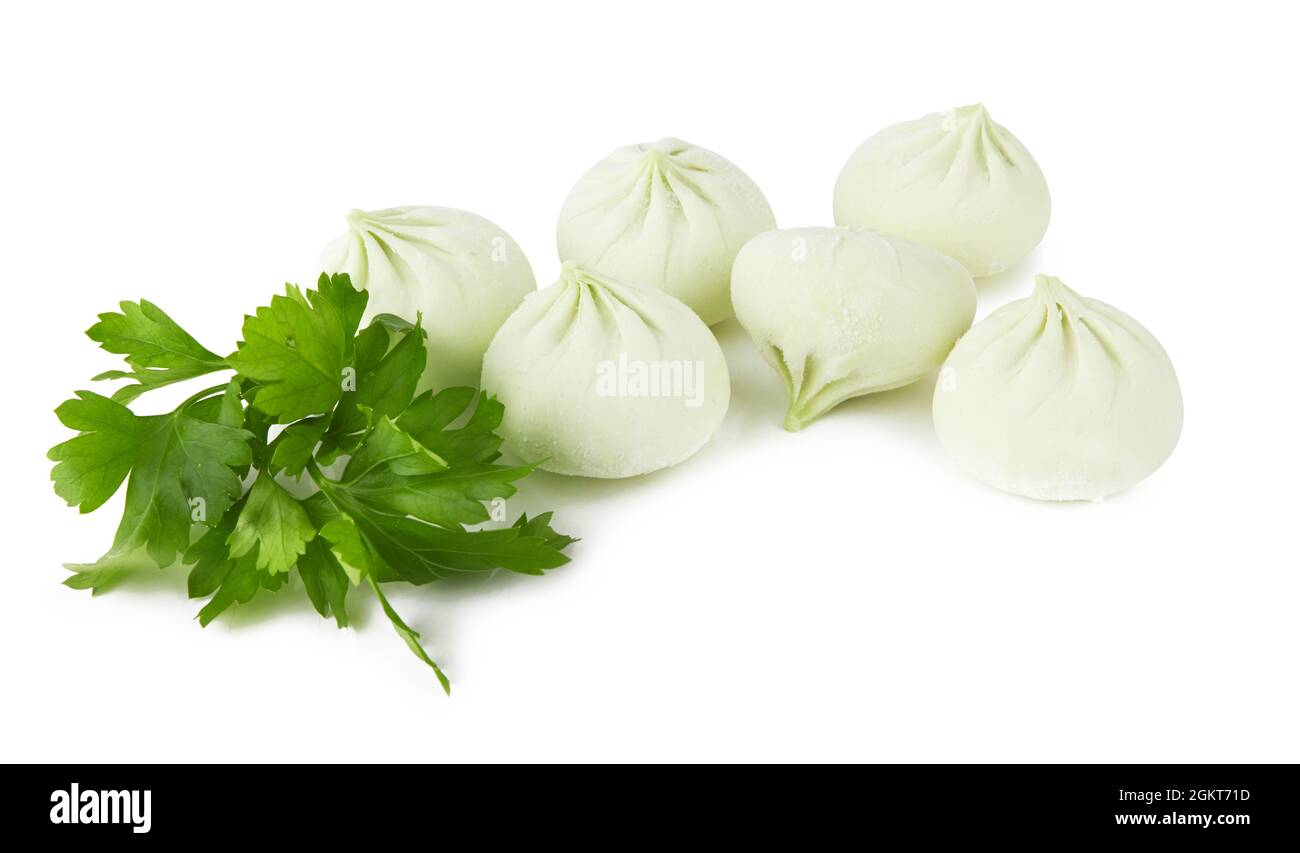 Frozen green khinkali isolated on white background Stock Photo - Alamy