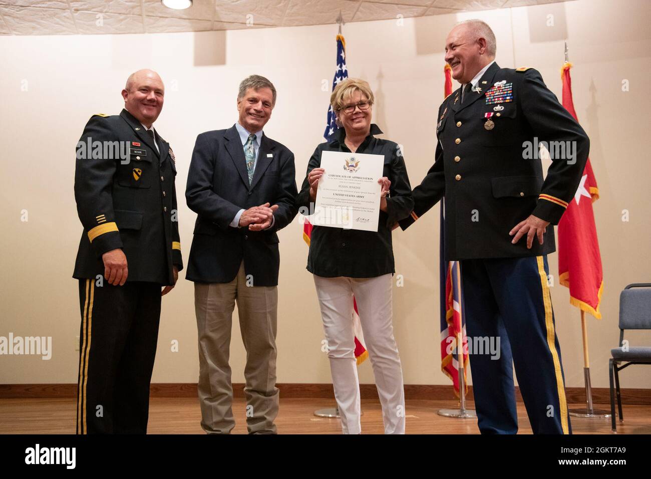 Col. Terry Jenkins’ wife Susan is presented awards for her support ...