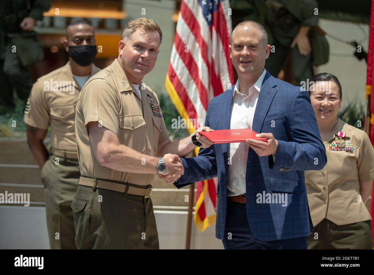 U.S. service members are joined by the family and friends of U.S ...