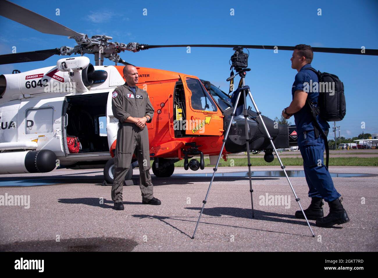 Coast Guard Lt. Cdr. George Menze is interviewed about a rescue, Coast ...