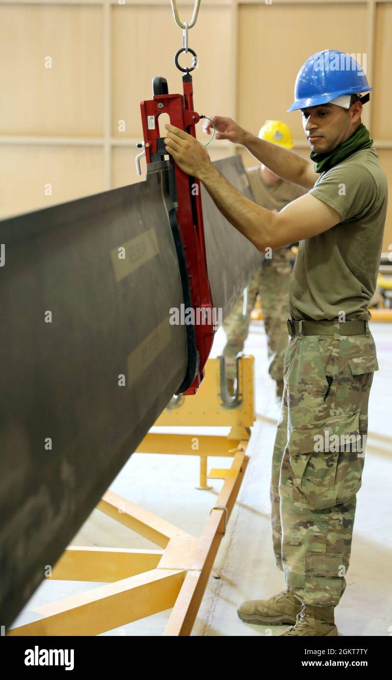 Spc. Michael Walldez, a UH-60 Black Hawk helicopter repairer with Bravo ...