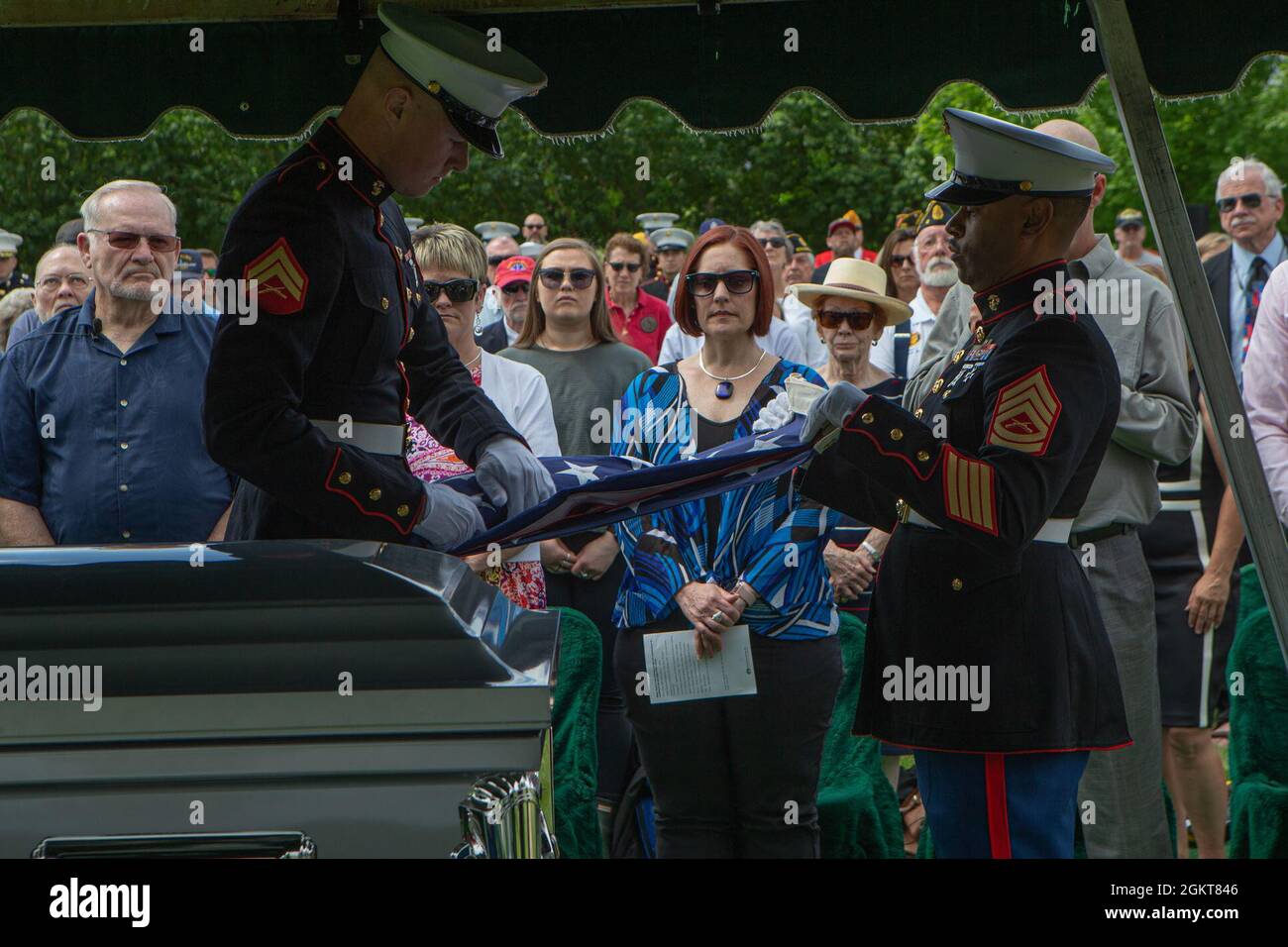 U.S. Marine Corps Cpl. Draxxon Lell (left) and U.S. Marine Gunnery Sgt ...