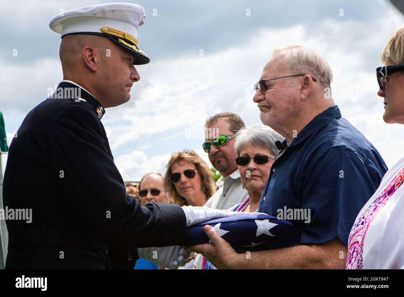 Retired U.S. Marine Corps Maj. Gen. William F. Mullen III presents a ...