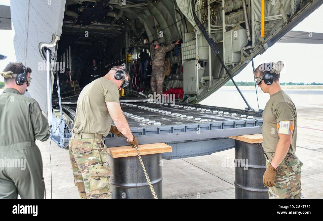 Airmen with the 143d Airlift Wing, Operations Squadron and Logistics ...