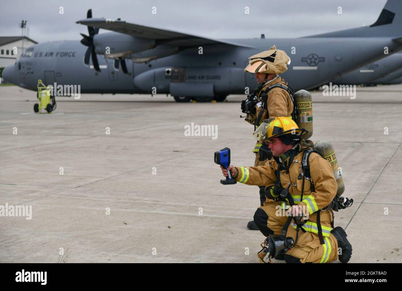 Firefighters with the 143d Airlift Wing, Civil Engineer Squadron ...