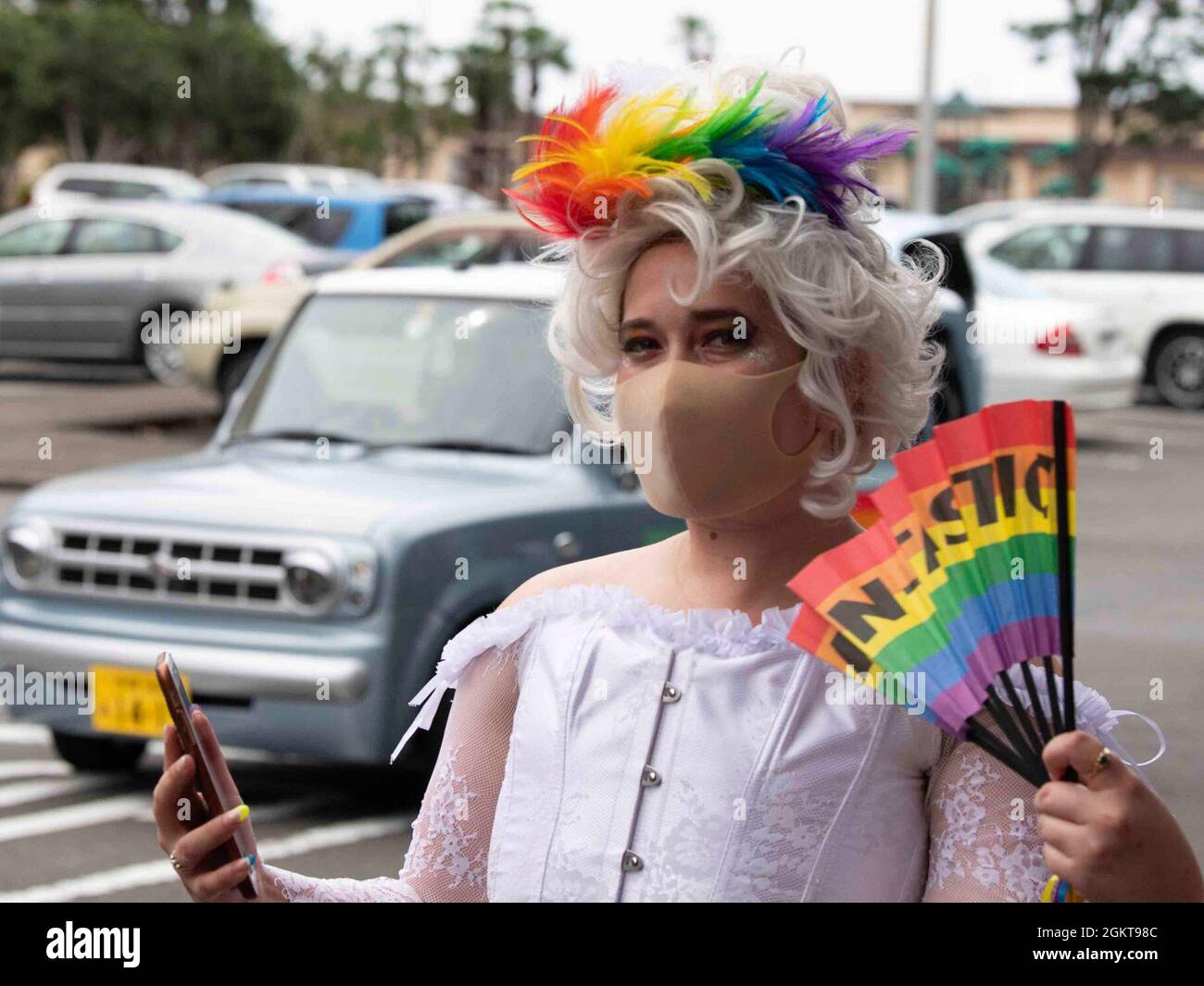 Erica Earl, pride parade participant, makes her way to the beginning of ...