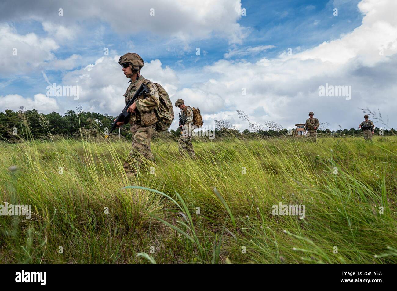 U.S. Army Soldiers perform tactical movements during a situational ...