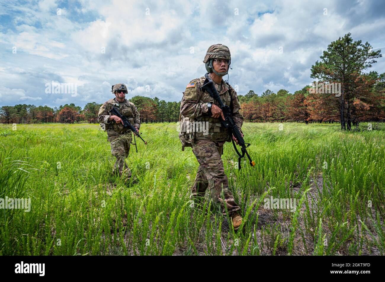 U.S. Army Soldiers perform tactical movements during a situational ...