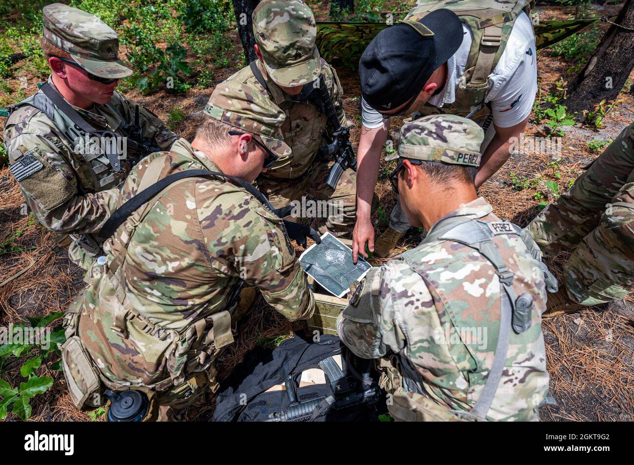 U.S. Army Soldiers perform tactical movements during a situational ...