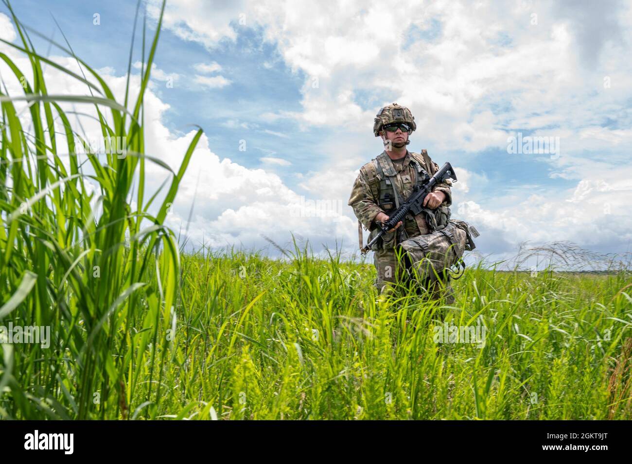 U.S. Army Soldiers perform tactical movements during a situational ...