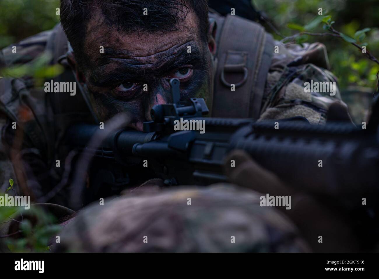 U.S. Army Soldiers post security during a situational training exercise ...