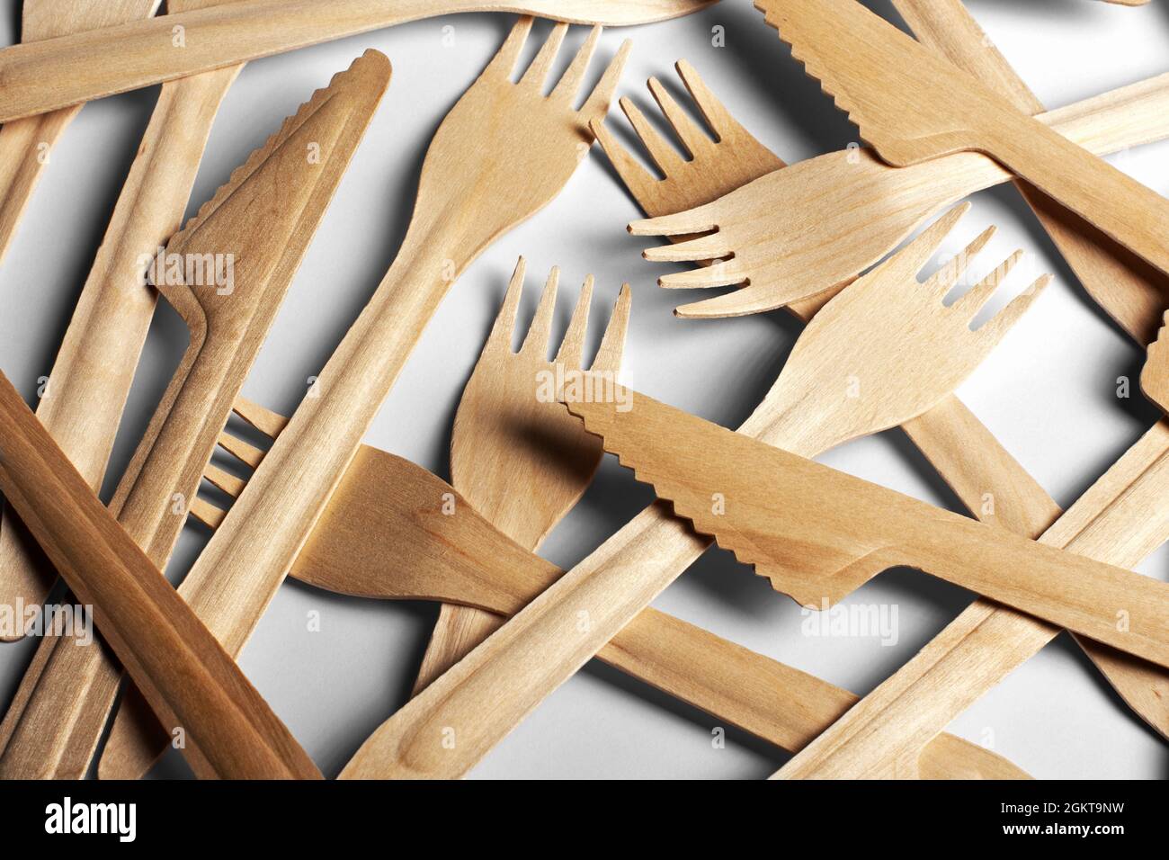 Wooden tableware background Stock Photo - Alamy