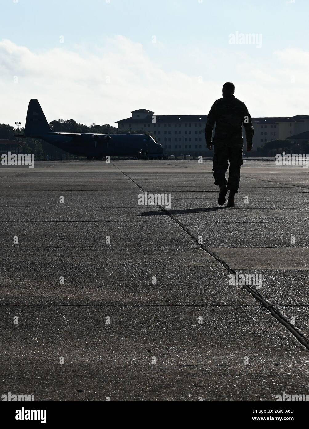Commander of the 908th Airlift Wing, Col. Craig Drescher, walks the ...