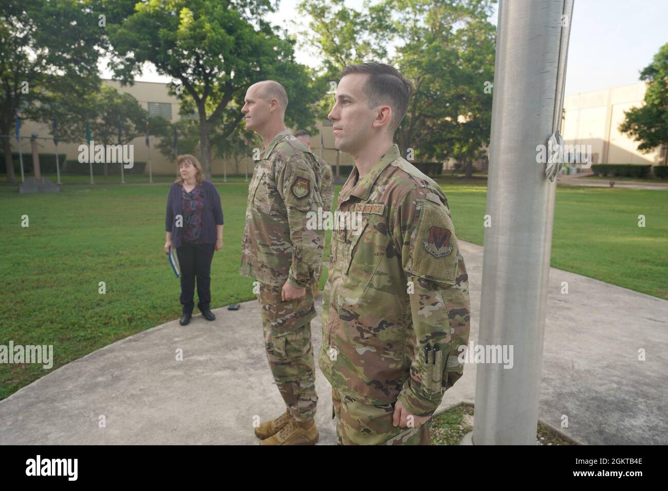 Tech Sgt. Kyle Bellone stands at attention before being awarded his ...