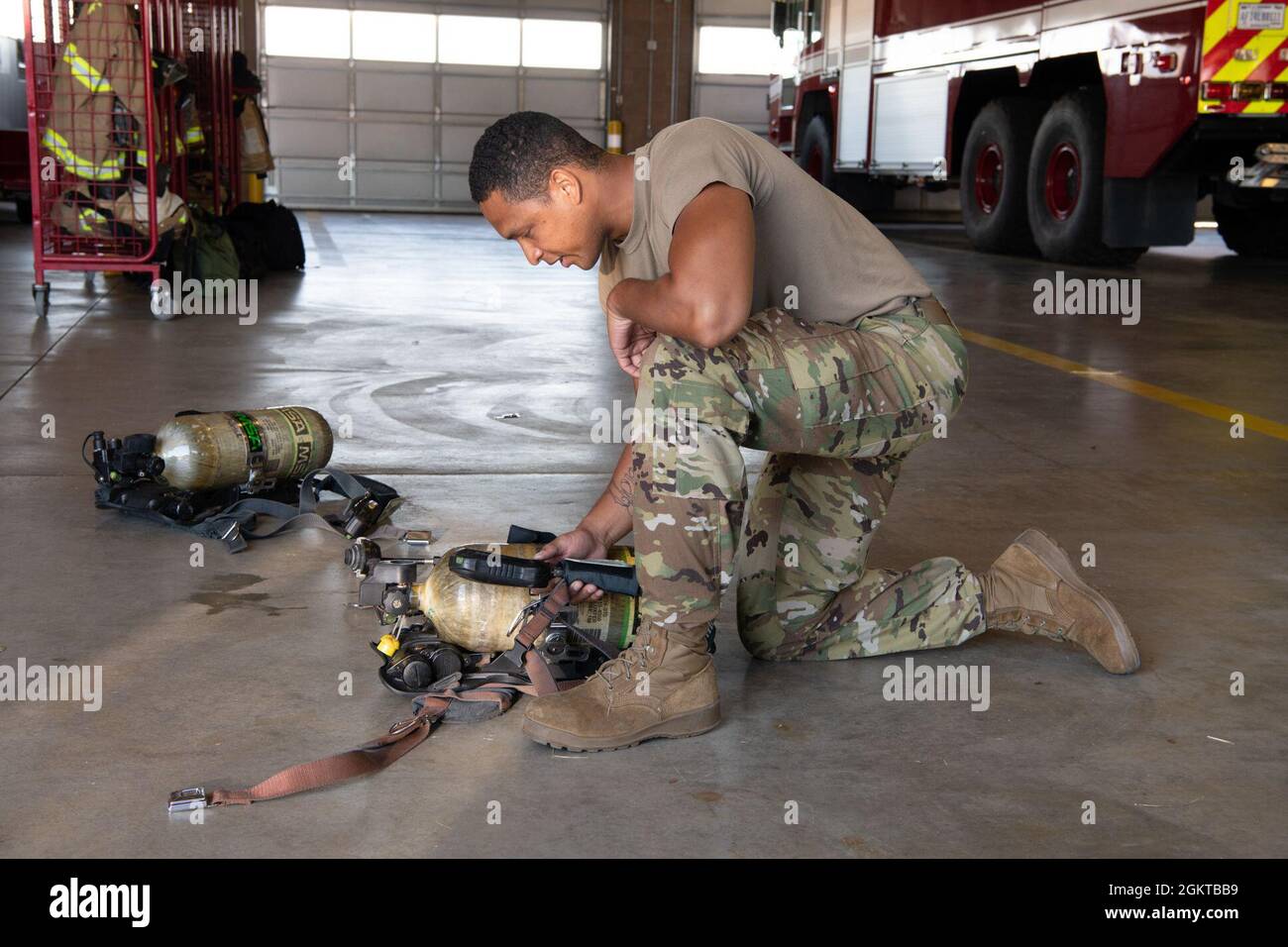Airman 1st Class Roman Runner, a firefighter with the 60th Civil ...