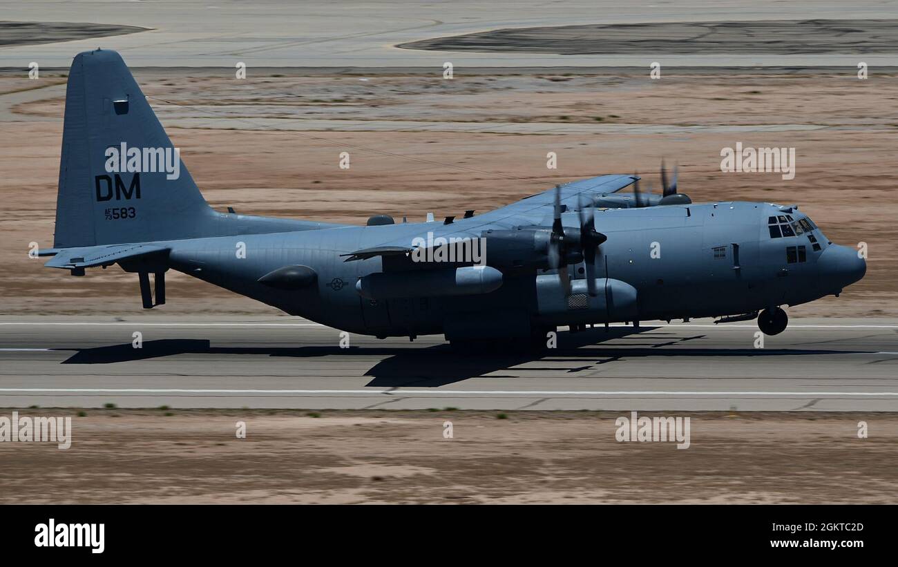 A U.S. Air Force EC-130H Compass Call takes off from the flight line ...