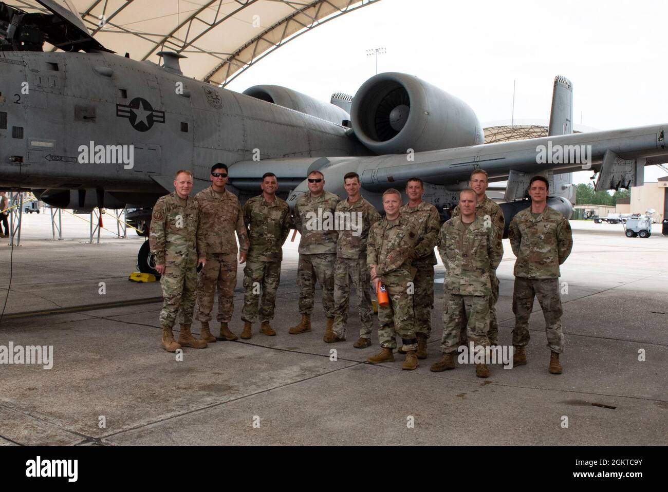 U.S. Air Force Airmen pose for a photo during an immersion tour with ...